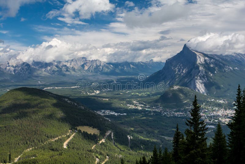 Canadian mountains, clouds stock photo. Image of peaceful - 87832728