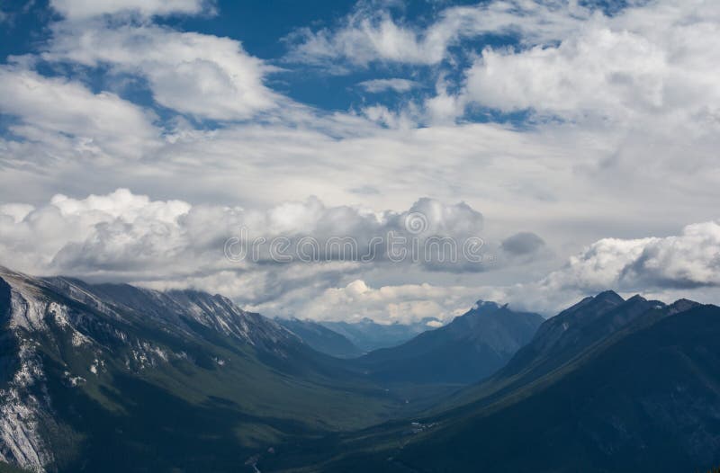 Canadian mountains, clouds stock image. Image of hiking - 87832827