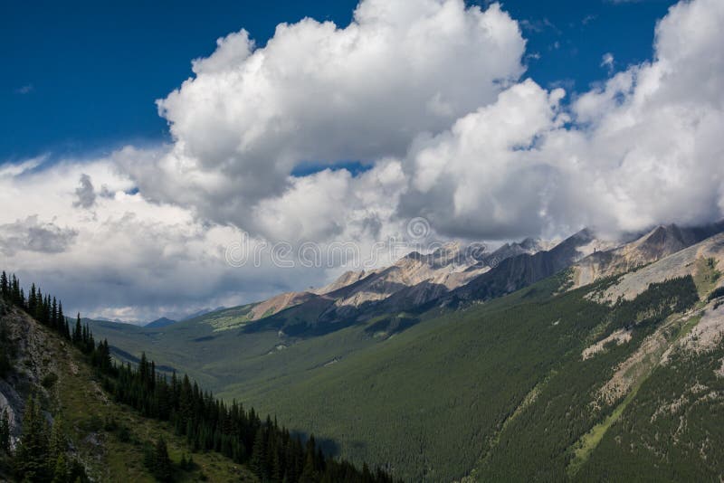 Canadian mountains, clouds stock image. Image of banff - 87832927
