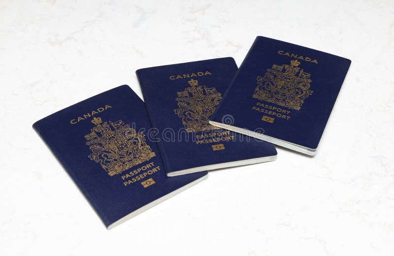 Canadian Passports on a White Marble Background Stock Photo - Image of ...