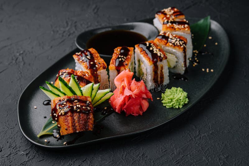 Canadian Roll with Eel on Black Plate from Stone Stock Image - Image of ...