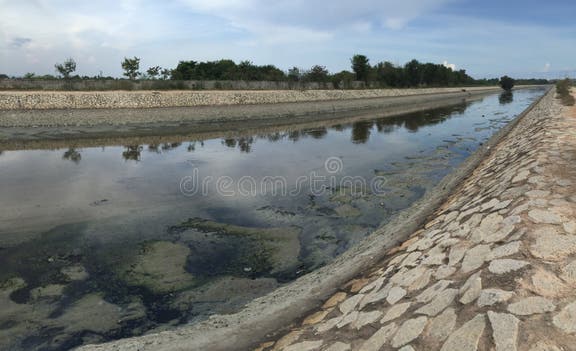 Canal of drain water stock image. Image of drain, clouds - 55272971