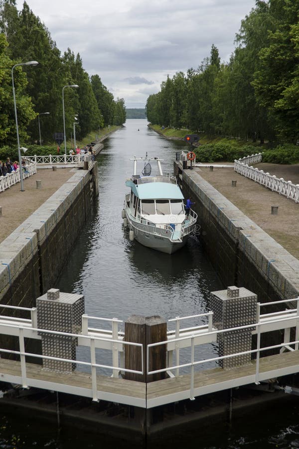 Canal locks with a ship editorial stock image. Image of passage - 58568539