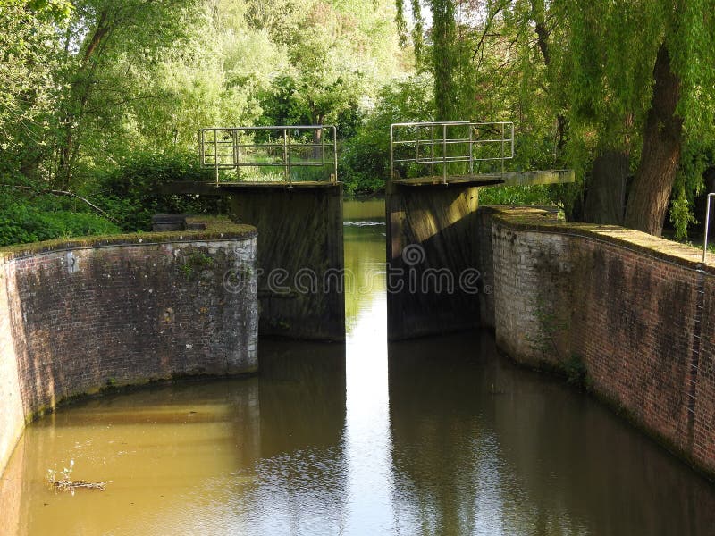 Canal and old water lock stock photo. Image of waterway - 92150000