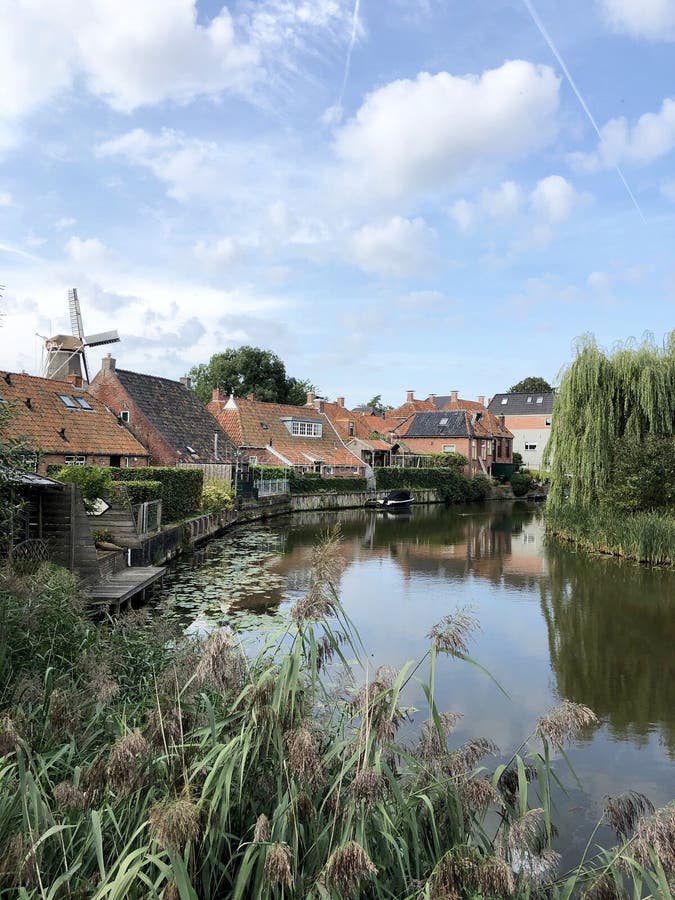 Windmill in Winsum editorial stock image. Image of town - 186336074