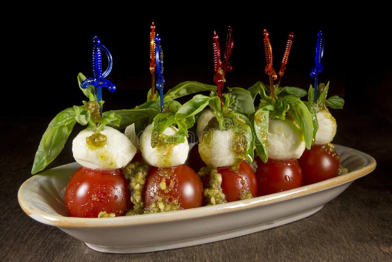 Canape Caprese for buffet stock photo. Image of delicious - 76592012