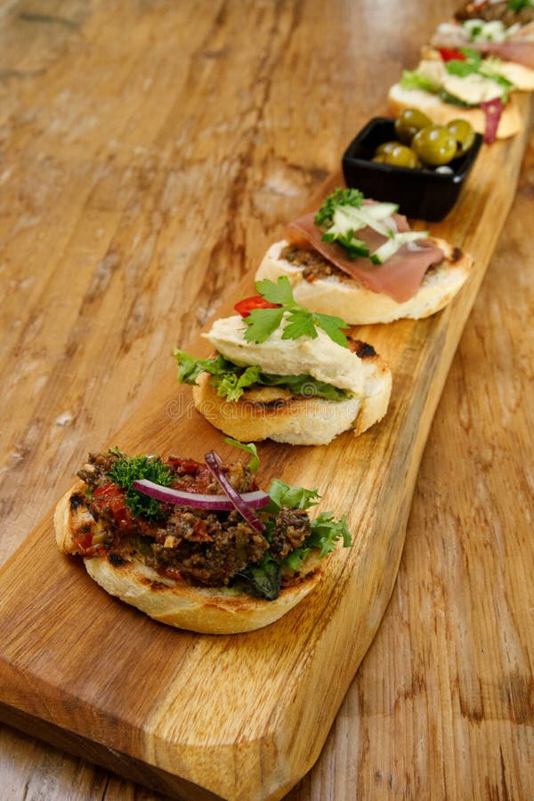 Canape or Crostini with Toasted Baguette and Various Spreads Stock ...
