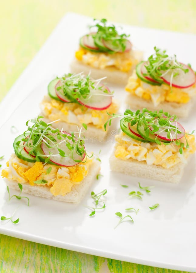 Canape with Egg, Cucumber, Radishes and Cress Stock Photo - Image of ...
