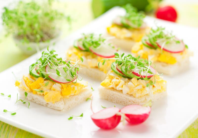 Canape with Egg, Cucumber, Radishes and Cress Stock Photo - Image of ...