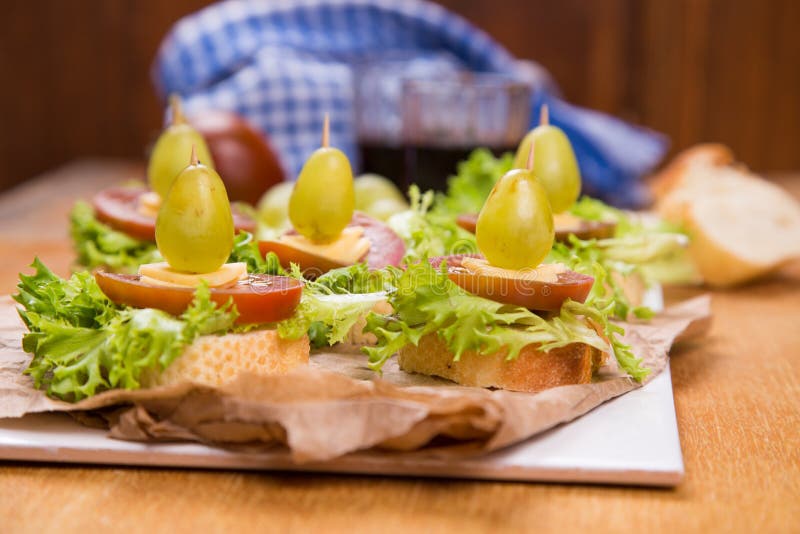 Canape with grape stock image. Image of snack, assorted - 80724383