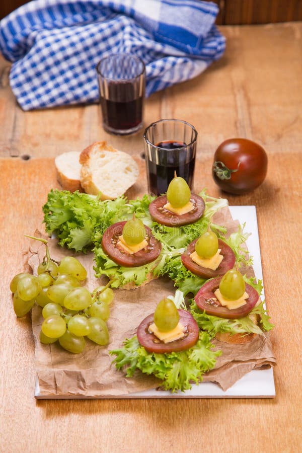Canape with grape stock photo. Image of gourmet, assorted - 80725856