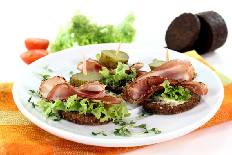 Canape mit bacon stock image. Image of food, appetizers - 22748937
