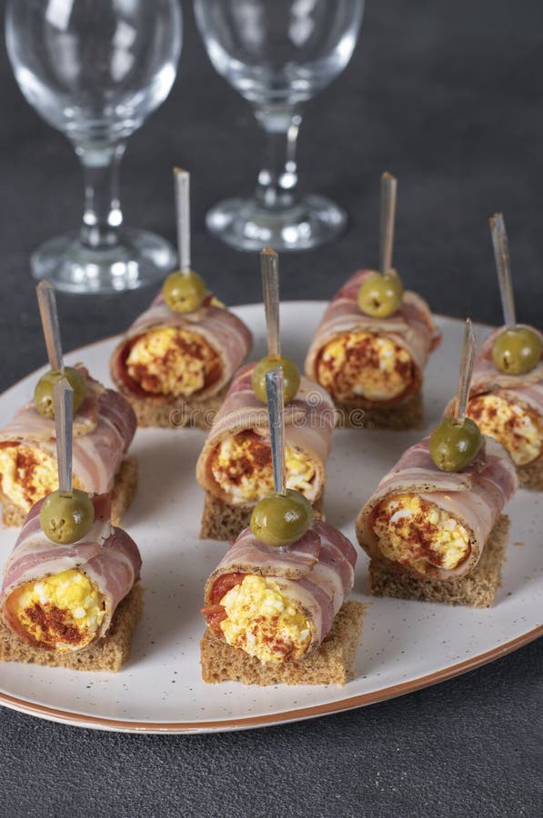 Canape with Pancetta Rolls with Egg and Processed Cheese on Bread ...