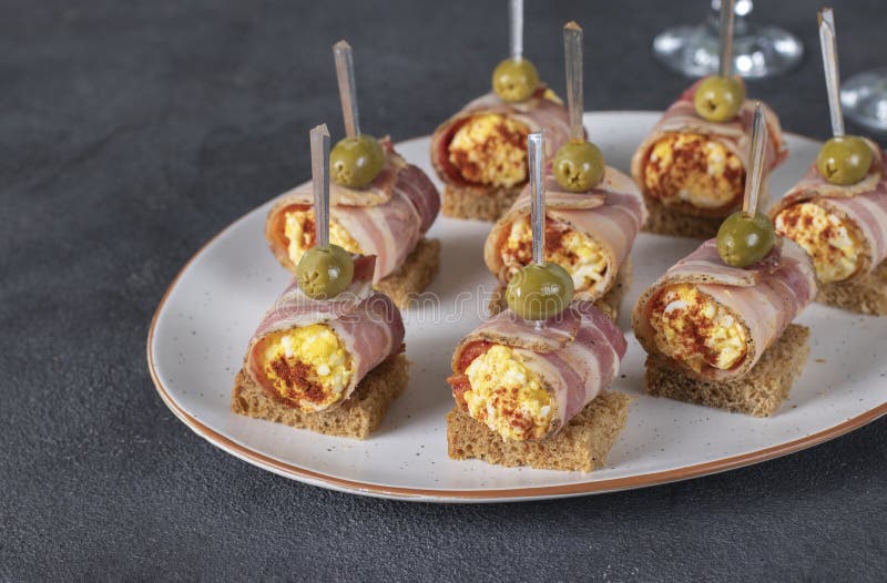 Canape with Pancetta Rolls with Egg and Processed Cheese on Bread ...