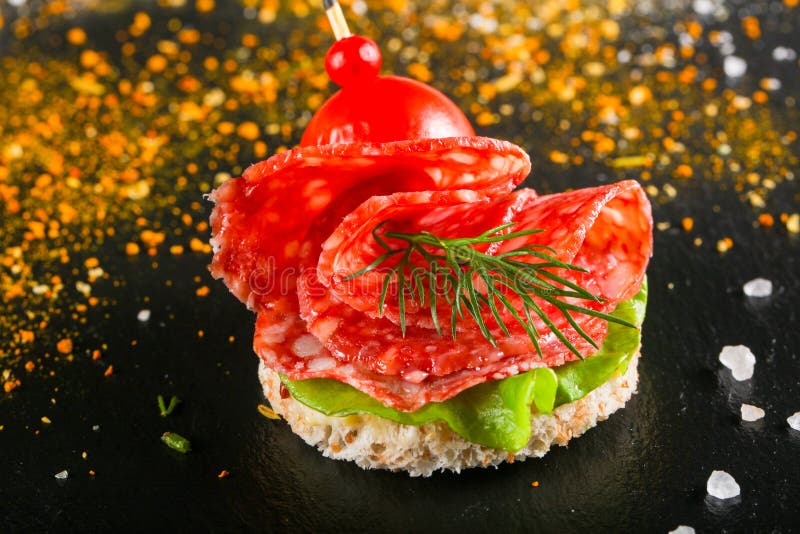 Canape with salami stock image. Image of green, appetizer - 112059633