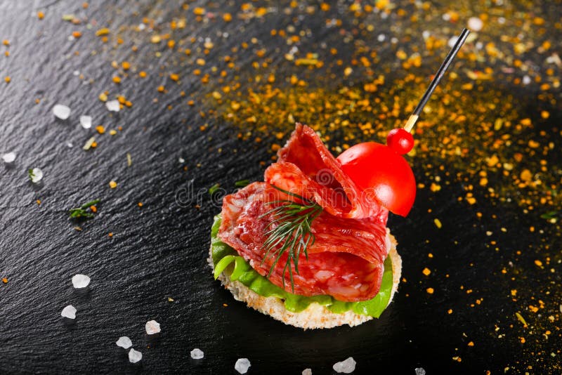 Canape with salami stock image. Image of sausage, cuisine - 123412885