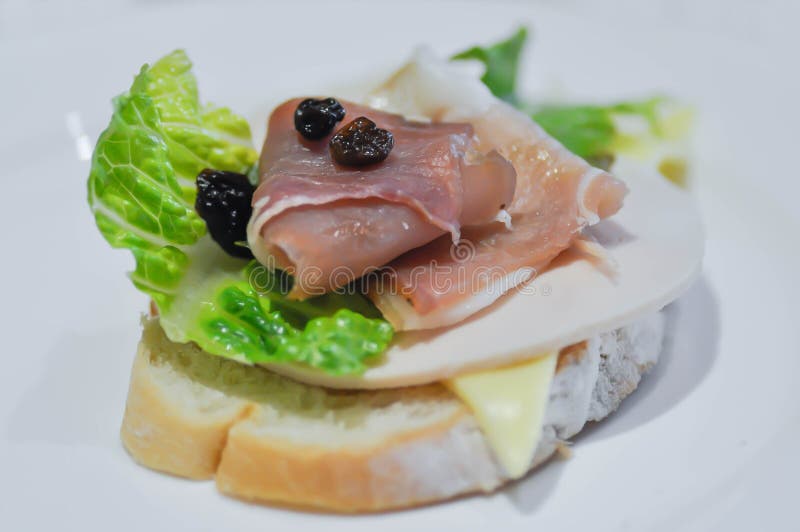 Canape, Toast with Ham and Cheese or Cold Cut and Lettuce Stock Image ...