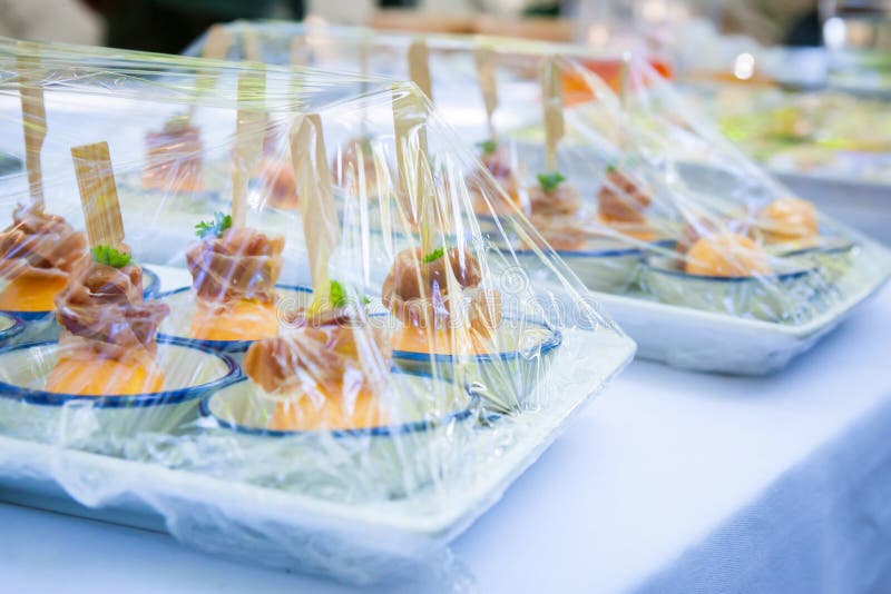 Canape Wrapped with Plastic Wrap. Stock Image - Image of canape ...
