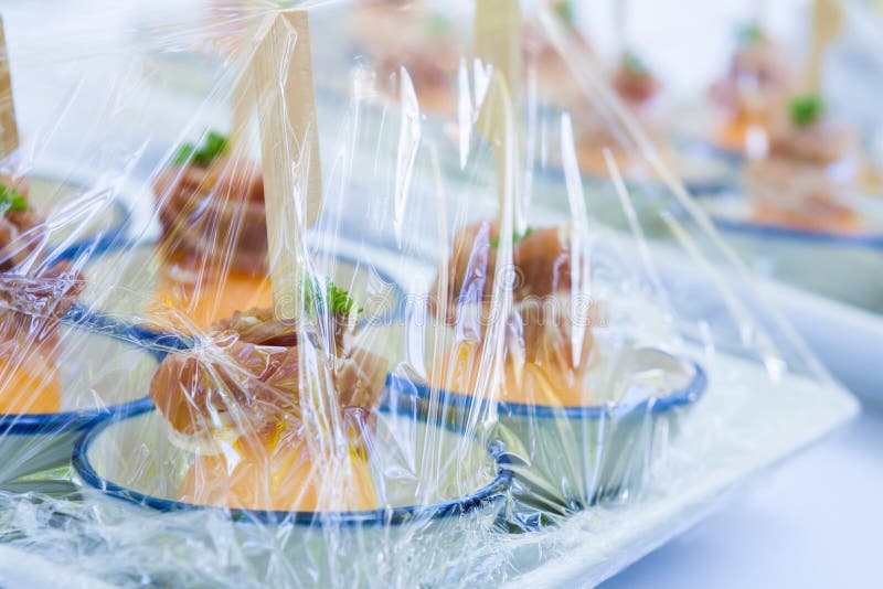 Canape Wrapped with Plastic Wrap. Stock Photo - Image of finger ...