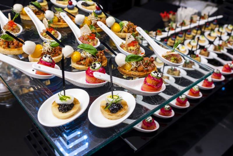 Canapes with Appetizers on a Buffet Table Stock Photo - Image of fish ...