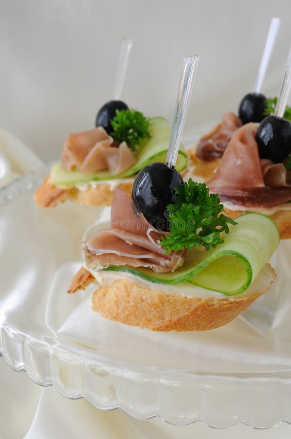Canapes with ham stock photo. Image of baguettes, serving - 26929344