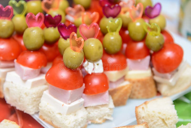 Canapes with Ham Tomato and Olive on a Toothpick Stock Image - Image of ...