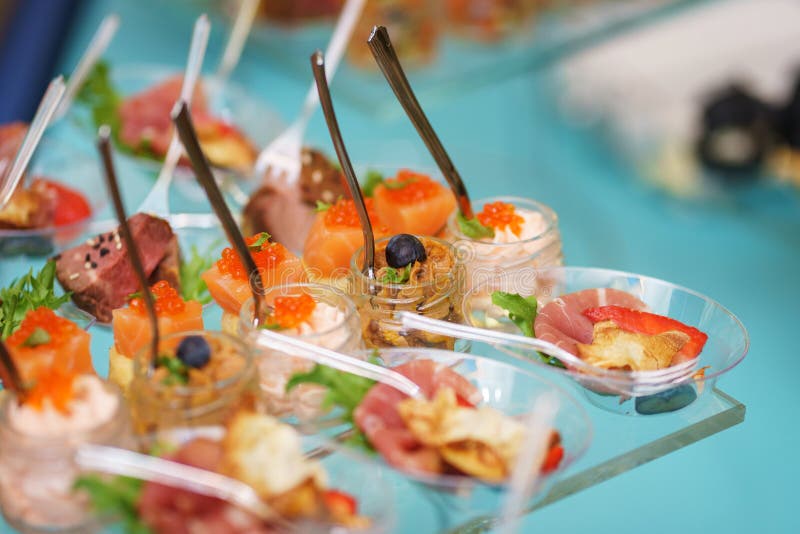 Canapes and Light Meals, Tapas on the Table in the Restaurant. Stock ...
