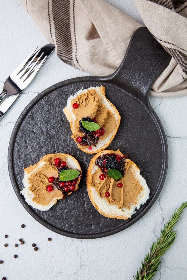 Canapes with Pate, Mint Leaves and Berries, Top View Stock Photo ...