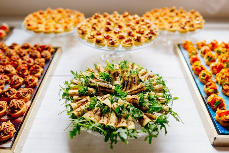 Canapes on plates stock photo. Image of catering, lined - 41591454