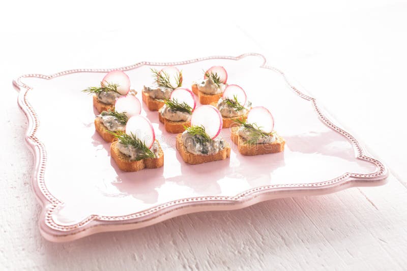 Canapes with radish stock image. Image of portion, food - 54881705