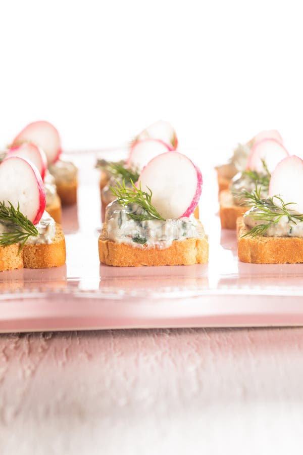 Canapes with radish stock image. Image of bread, portion - 54882255