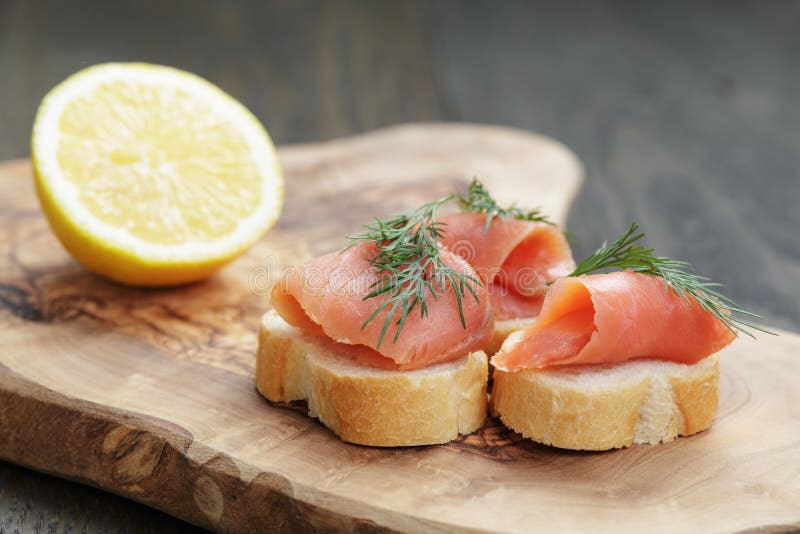 Canapes with Salmon, Dill and Lemon Stock Photo - Image of fingerfood ...