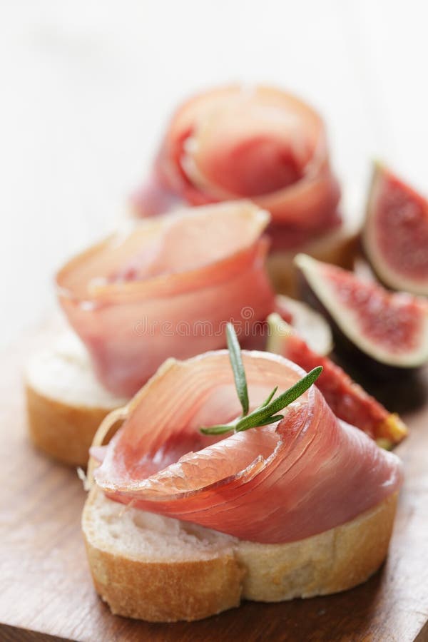 Canapes with spanish jamon stock photo. Image of smoked - 40718530