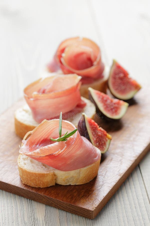 Canapes with spanish jamon stock image. Image of meat - 40718535