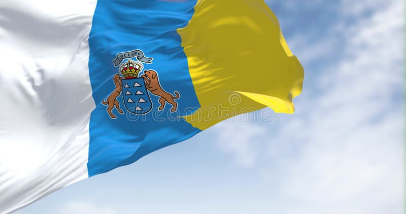 Canary Islands and Spanish Flag Waving in the Wind on a Clear Day Stock ... Canary Islands and Spanish Flag Waving in the Wind on a Clear Day Stock ...