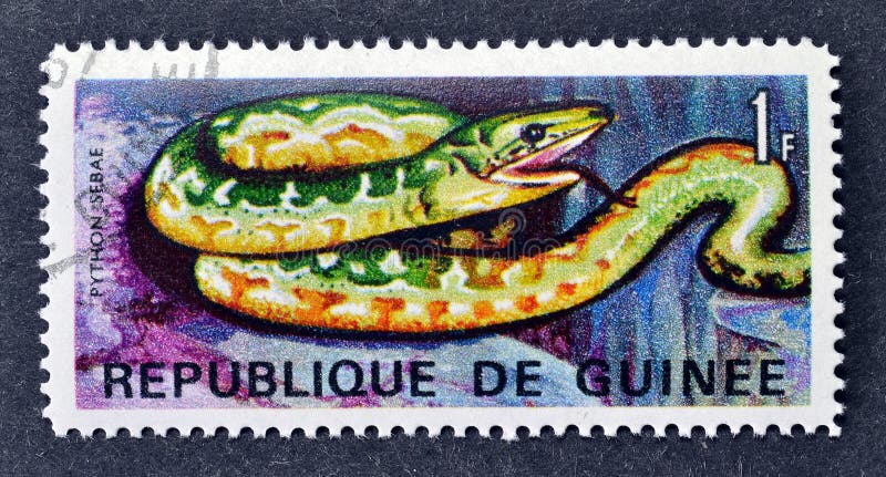 Cancelled Postage Stamp Printed by Guinea, that Shows African Rock ...