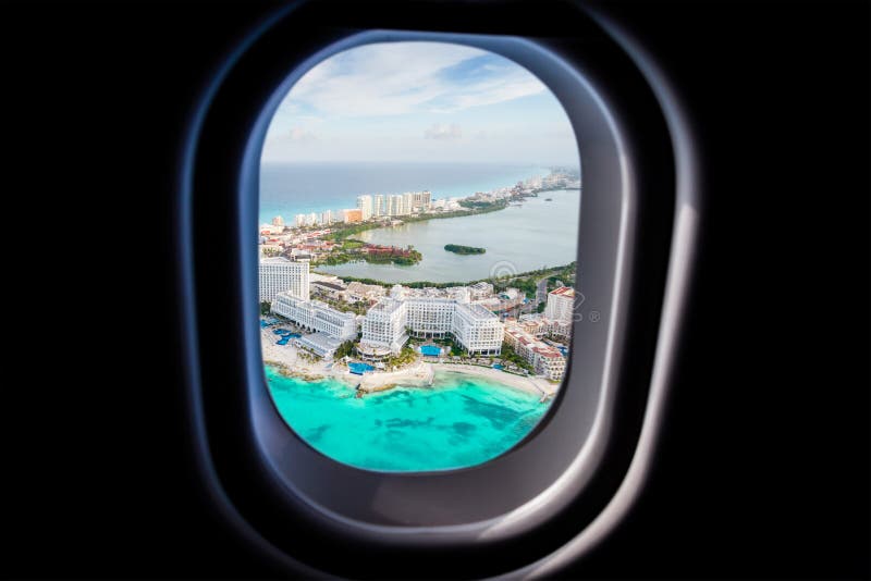 View through a Jet Plane Window High on the Blue Sky on Abu Dhabi UAE ...