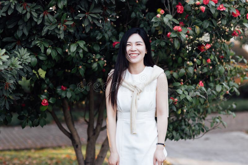 Candid Lifestyle Portrait Of Happy Young Beautiful Asian Woman Enjoying