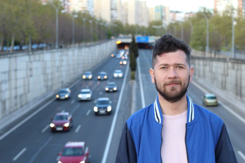 Ethnically Ambiguous Man in Orange Background Stock Photo - Image of ...