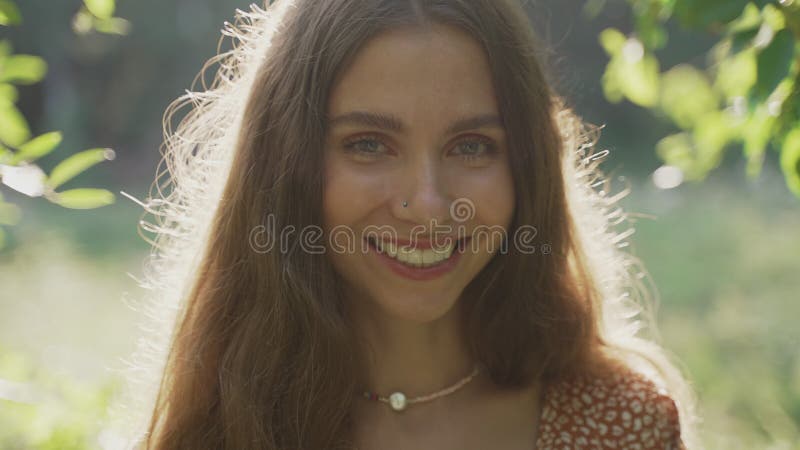 Candid Portrait Of A Beautiful Young Girl In Natural Sunlight A Girl