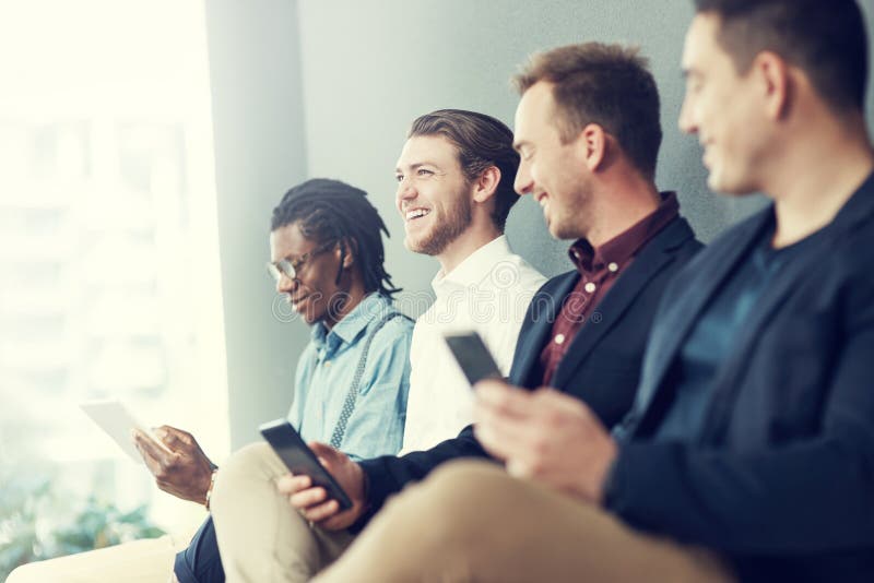 Candidate Conversations while we Wait. a Group of Businessmen Using ...