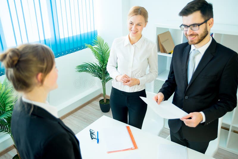 Candidate Handing Over a Resume Stock Photo - Image of resume ...
