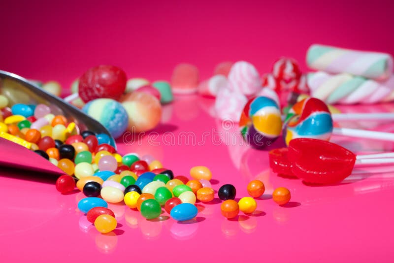 Candies Assortment on Pink Background Stock Image - Image of dessert ...
