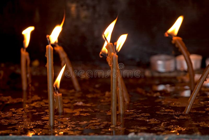 Some Ignited Candles in a Support Stock Photo - Image of fervor ...