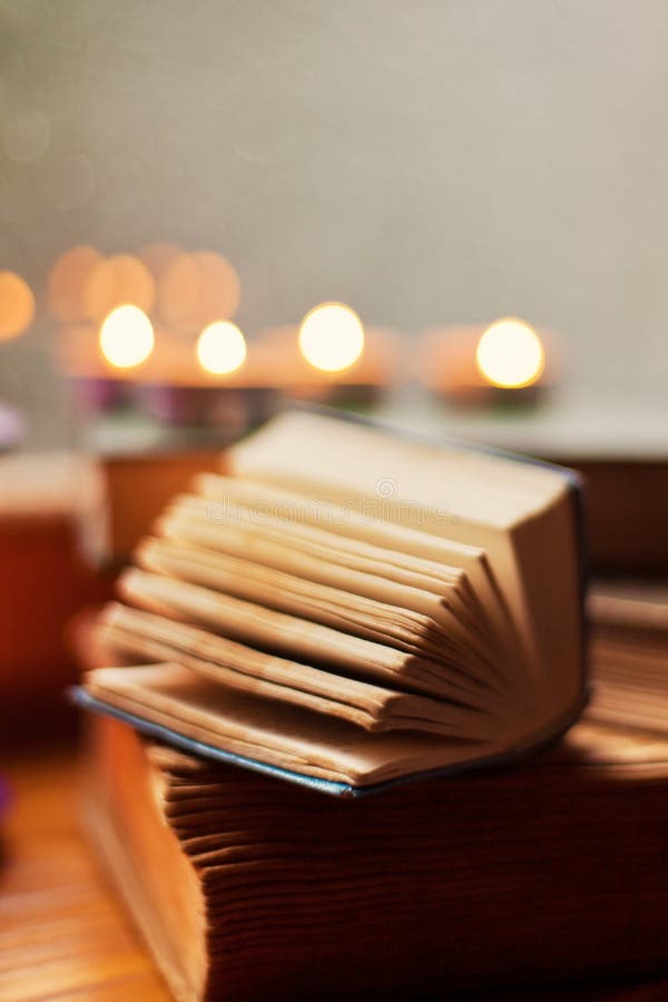 Candle and books stock photo. Image of glass, religion - 37269528