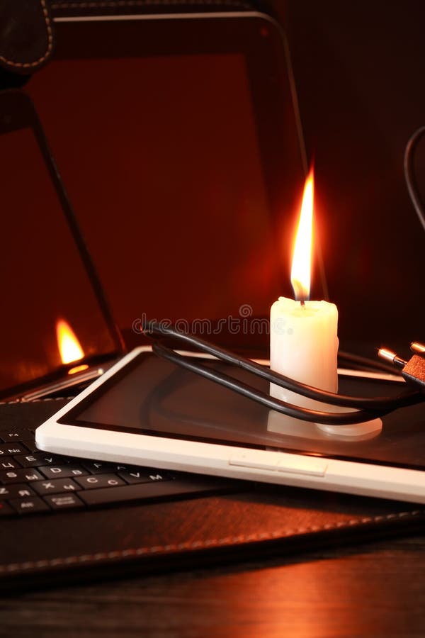 Candle on Laptop stock image. Image of fire, internet - 68431203