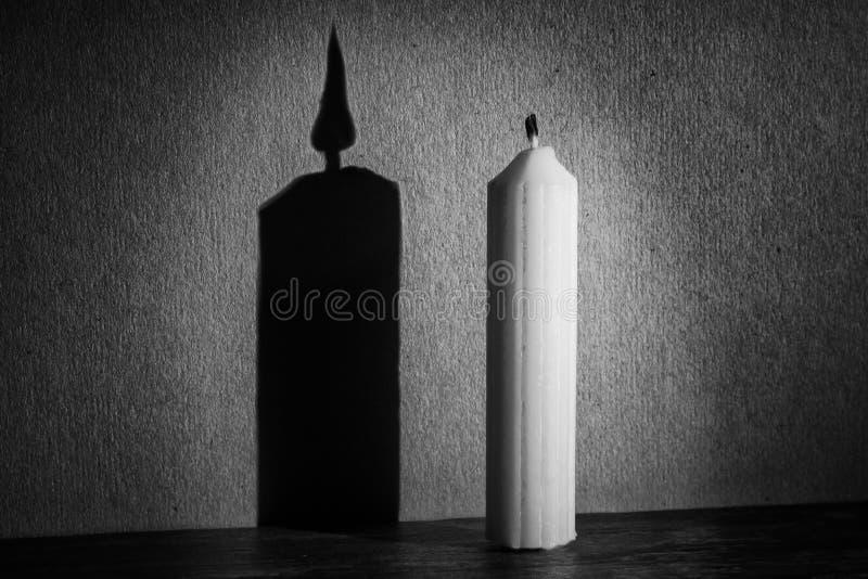 Candle in Darkness with Spotlight Making Shadow Stock Photo - Image of ...