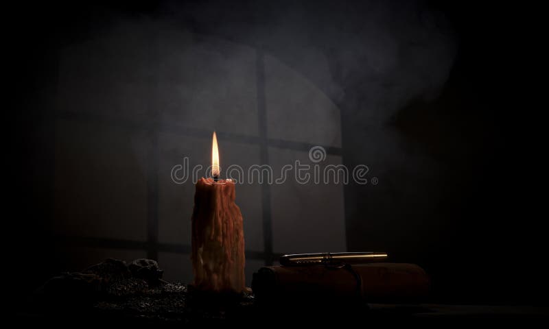 Candle with Dramatic Smoke Background and Lighting Effects and Antique ...
