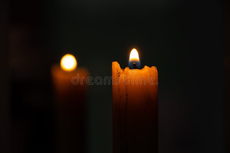 Candle Fire and Back Reflection of a Candle in a Mirror in the Dark ...