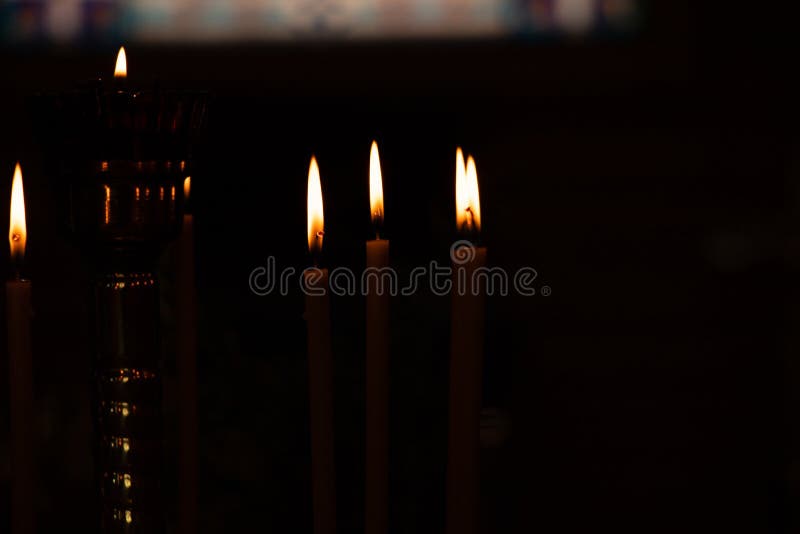 Candle Flame in the Dark in the Church, Burning Candle Stock Image ...